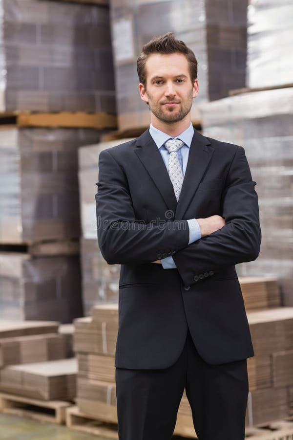 Male Manager Relaxing with Feet Up while Using Mobile Phone at Desk ...