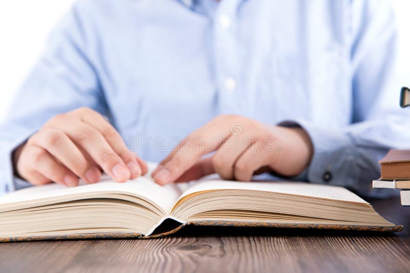 Serious Male Reader at Home Stock Image - Image of hand, study: 230699967
