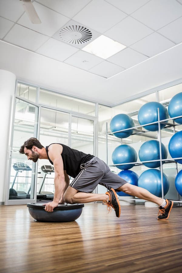 Serious Man Doing Exercise with Bosu Ball Stock Image - Image of ...