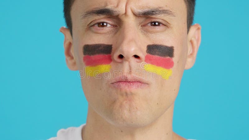 Serious Man with a German Flag Painted on the Face Stock Video - Video ...
