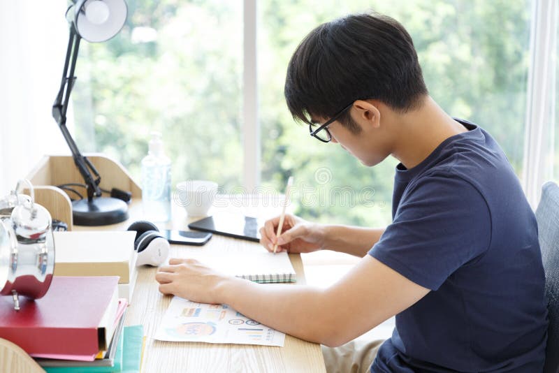 Serious Man Making Note and Checking on Paper Chart Report Stock Photo ...