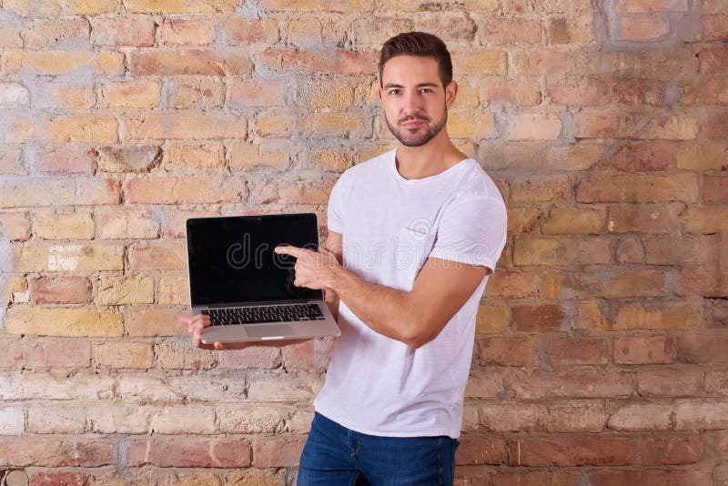 Serious Man Pointing To Screen Stock Photo - Image of computer, worker ...