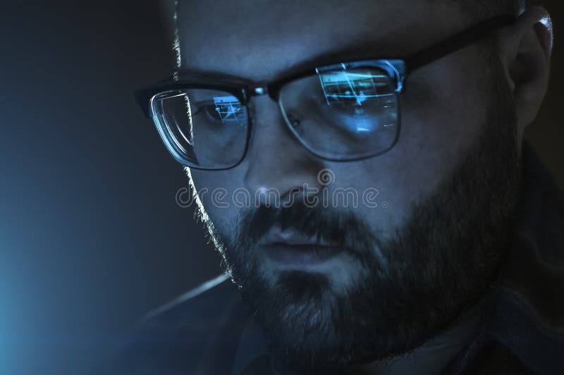 Serious Man with Reflection of Laptop Screen with Website Data in ...