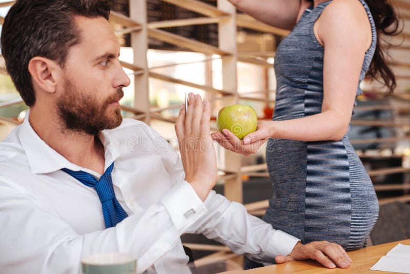 Serious Man Refusing Having an Apple Stock Photo - Image of project ...