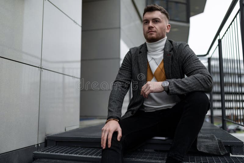 Serious Man Sitting Outside and Looking at the Camera Stock Photo ...