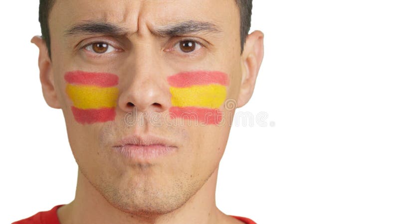 Serious Man with a Spanish Flag Painted on the Face Stock Photo - Image ...