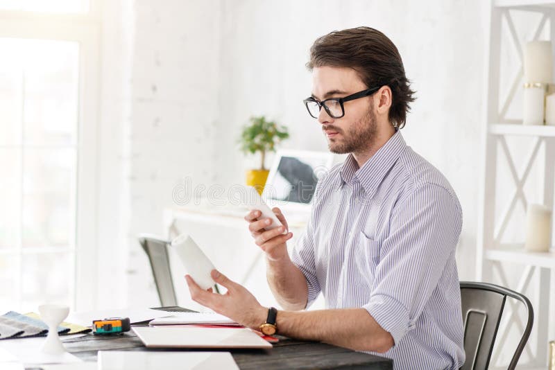 Serious Man Taking Pictures Of A White Object Stock Photo - Image of ...