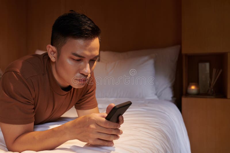Serious Man Texting stock image. Image of texting, online - 245556033