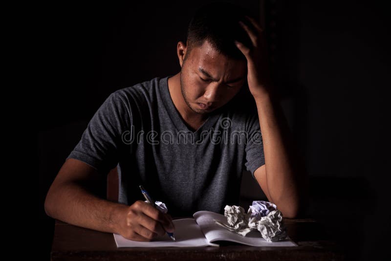 Serious Man Writing in Dark Room Stock Image - Image of confused ...