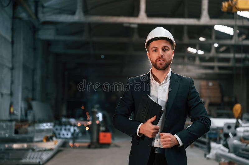 Serious Manager in Black Formal Wear is at the Factory Stock Image ...
