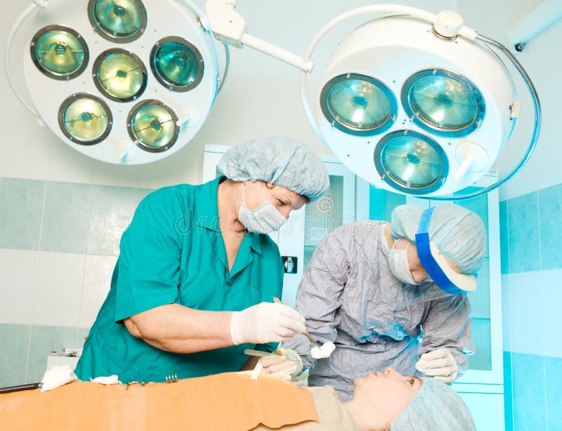 Serious medical operation stock photo. Image of care - 23115854