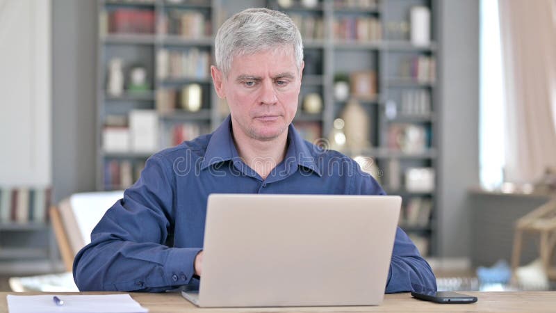 Serious Middle Aged Man Working on Laptop Stock Photo - Image of trader ...