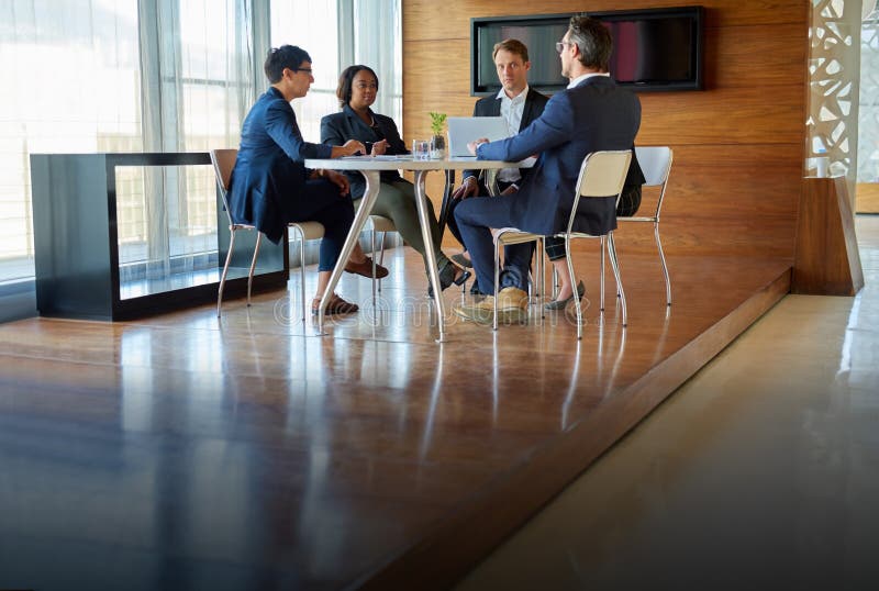 On a Serious Note...corporate Businesspeople Meeting in the Boardroom ...