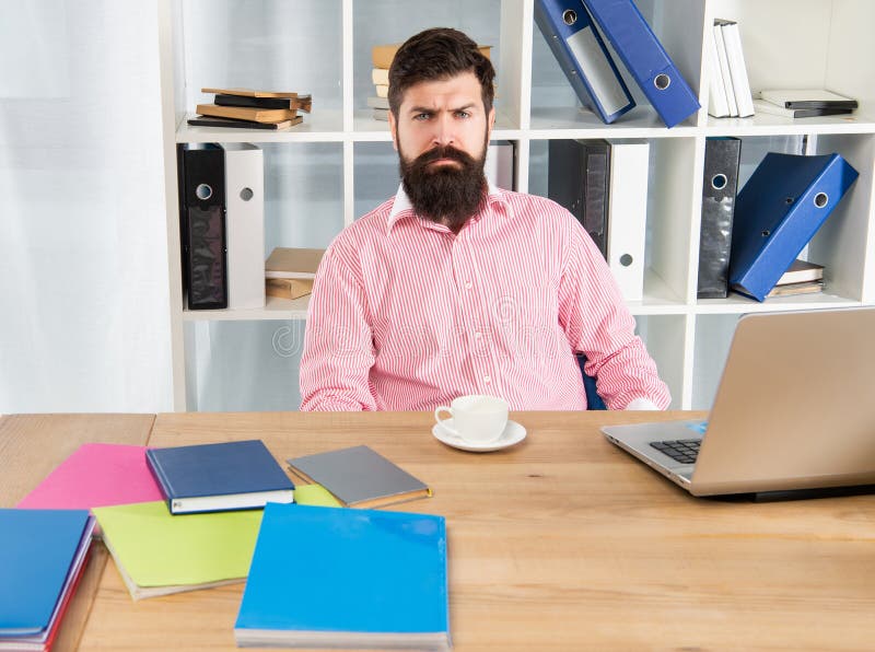 Serious Office Worker. Businessman Sitting at Desk Stock Photo - Image ...