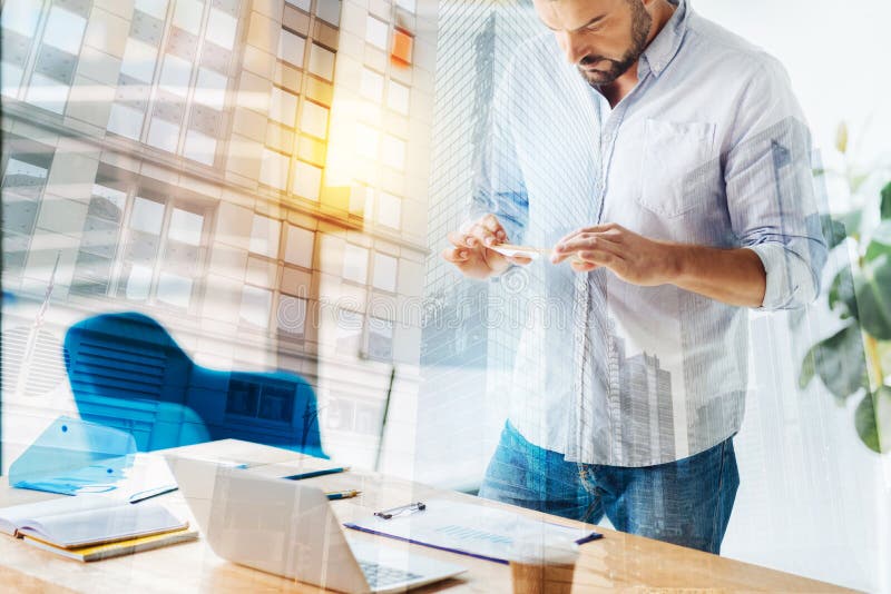 Serious Office Worker Standing at His Workplace Stock Image - Image of ...