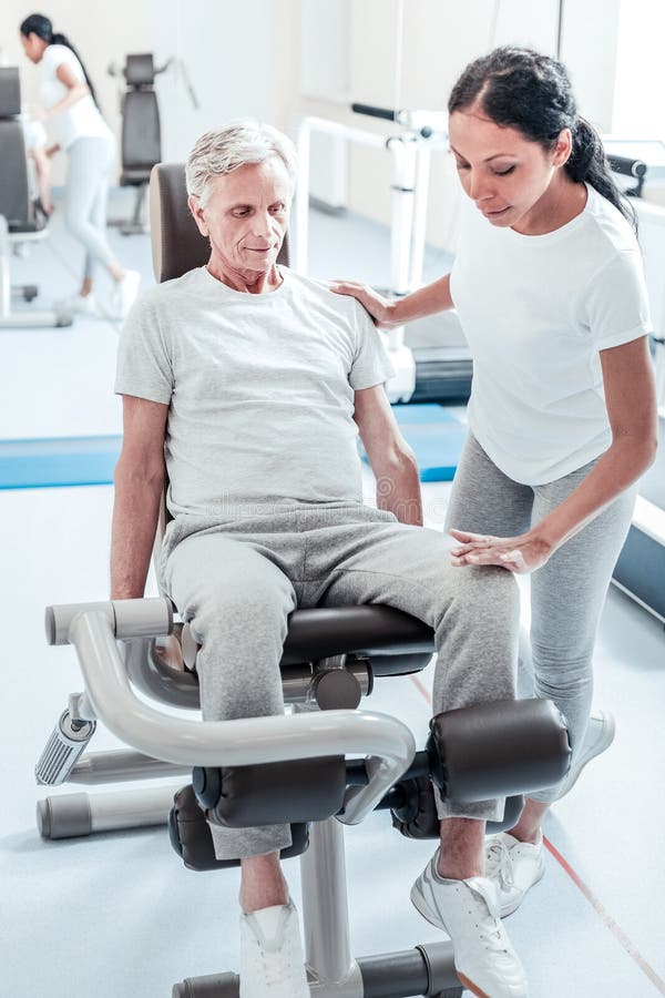 Serious Old Man and His Trainer Exercising Stock Photo - Image of ...