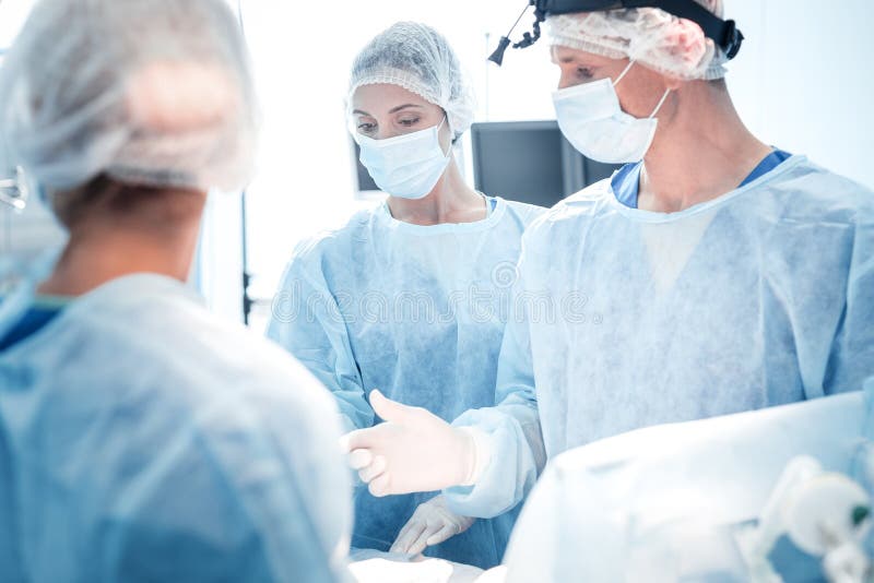 Nice Handsome Surgeon Working Stock Photo - Image of mask, healthcare ...