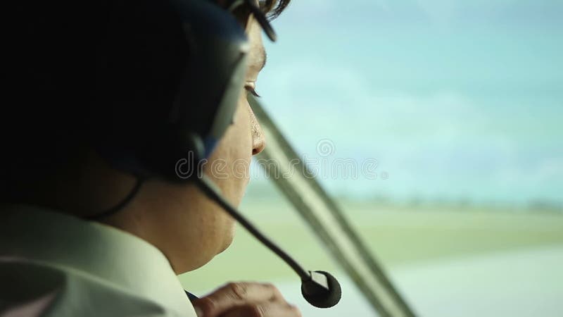 Serious Pilot Sitting in Cockpit, Preparing for Flight, Nervous before ...
