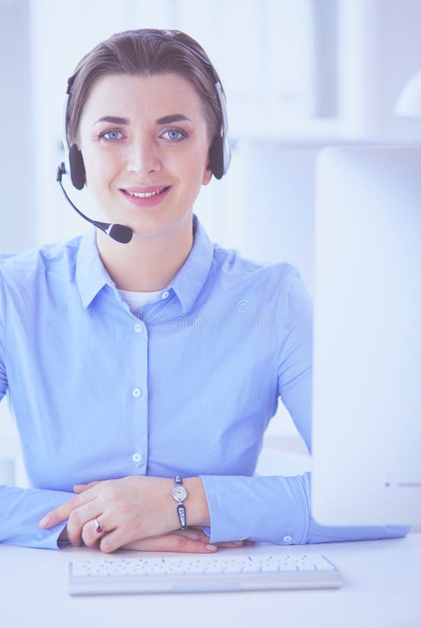 Serious Pretty Young Woman Working As Support Phone Operator with ...