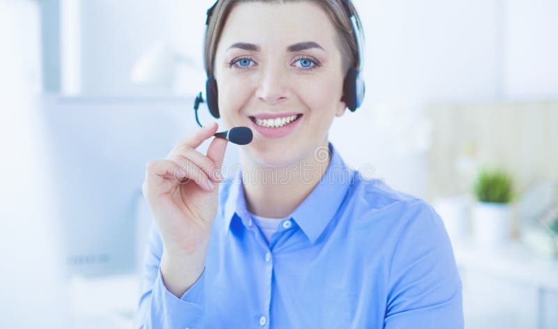 Serious Pretty Young Woman Working As Support Phone Operator with ...