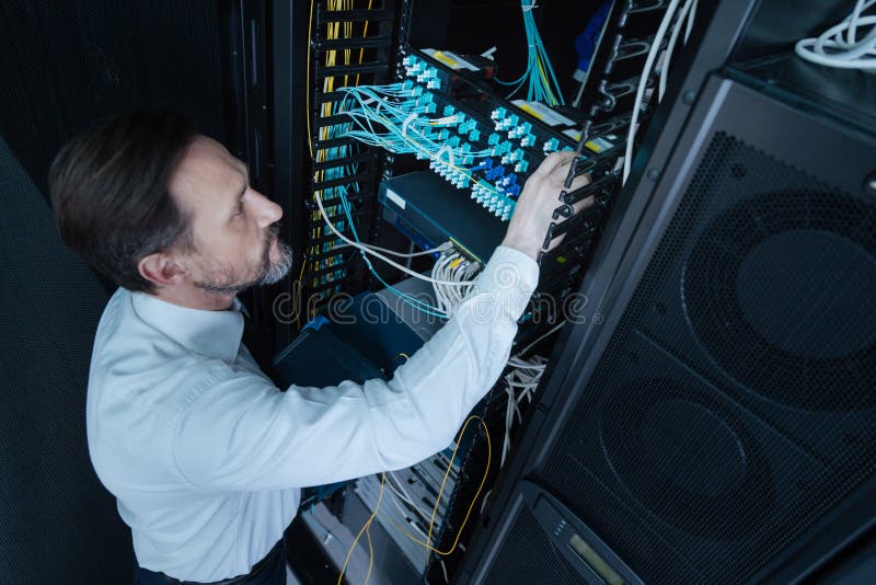 Serious Professional Technician Examining Internet Connection Stock ...