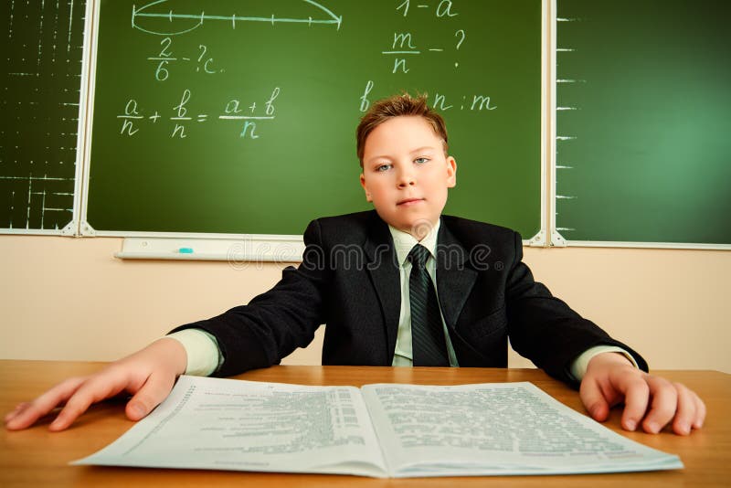 Serious pupil stock image. Image of school, desk, educate - 39876239