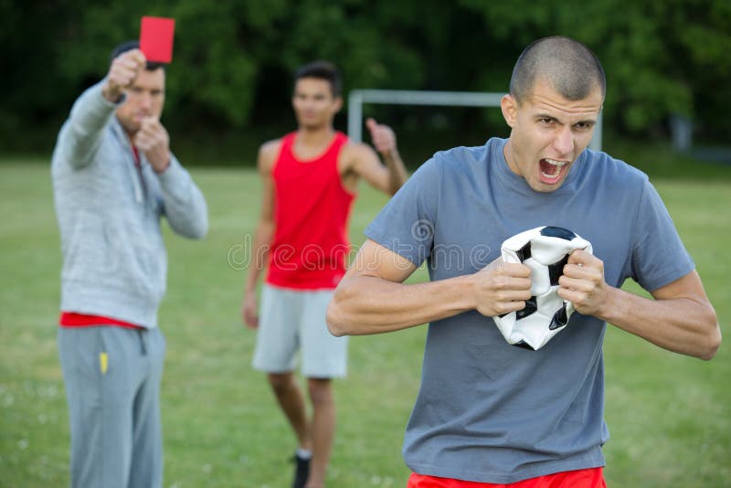 Serious Referee Showing Red Card To Player Stock Photo - Image of blue ...
