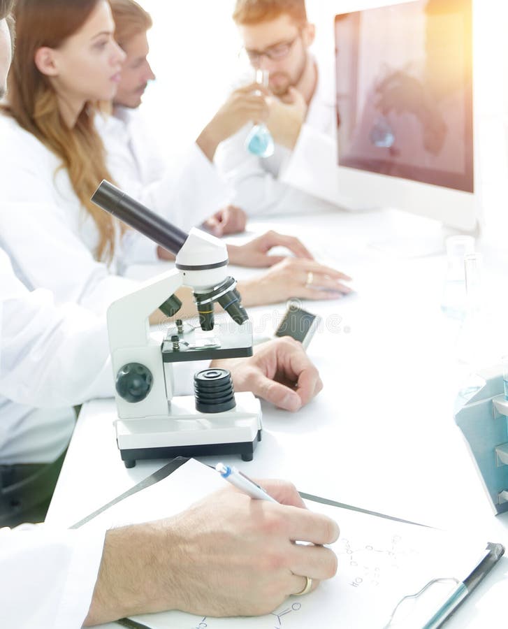Serious Scientists Working in the Laboratory Stock Image - Image of ...