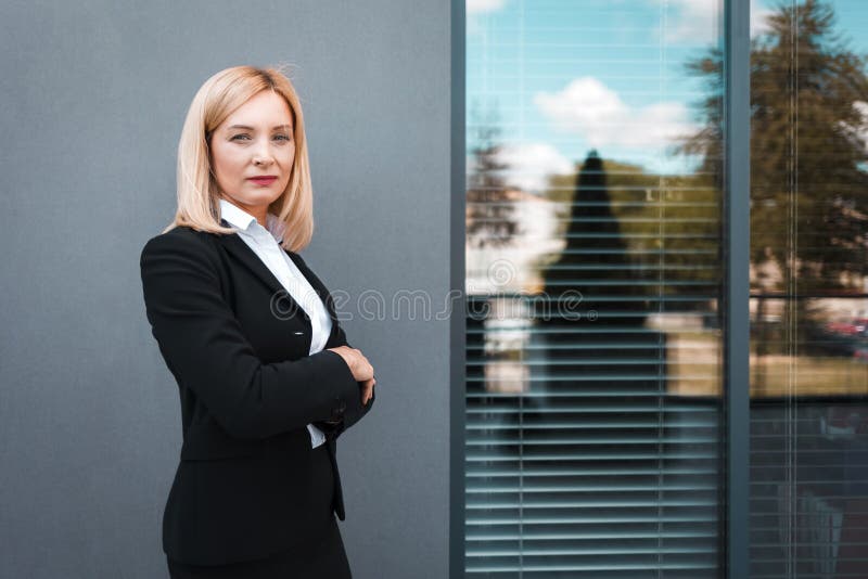 Serious Secretary with Red Laptop Stock Image - Image of beautiful ...