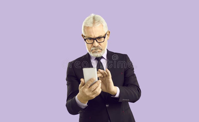 Serious Senior Man Have Problems Using Smartphone Stock Photo - Image ...