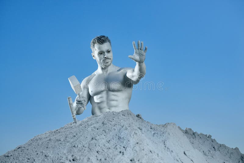 Silver Man from Stone among Grey Sand Showing Hand. Stock Photo - Image ...