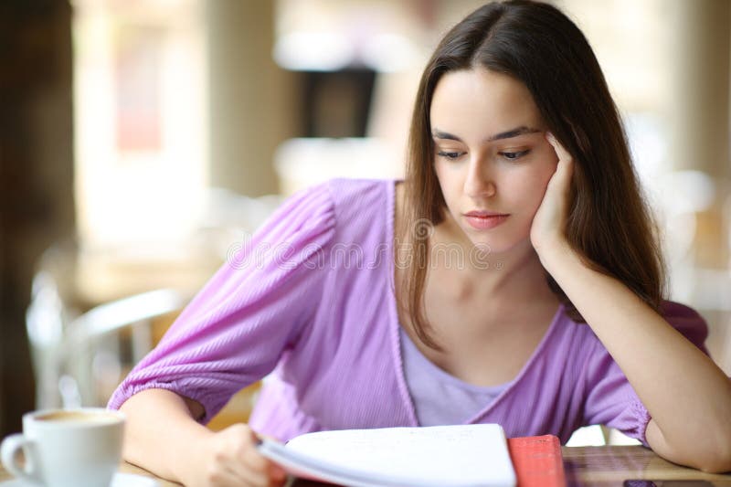 Serious Student Reading Notes Learning in Bar Terrace Stock Photo ...