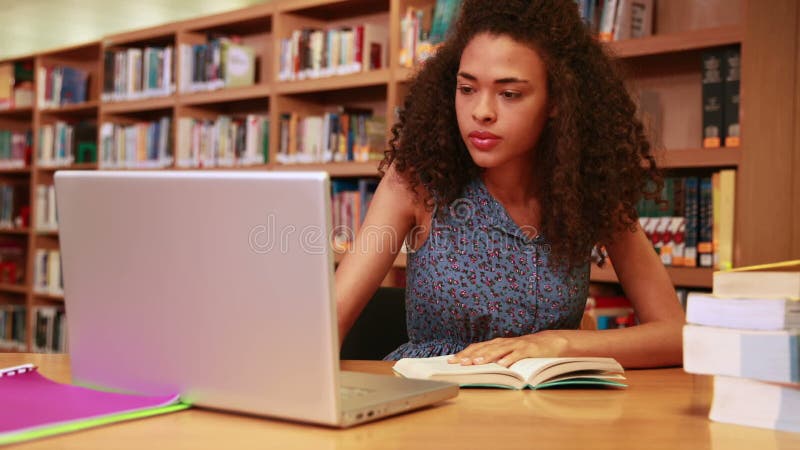 Serious Student Studying and Smiling at Camera Stock Footage - Video of ...