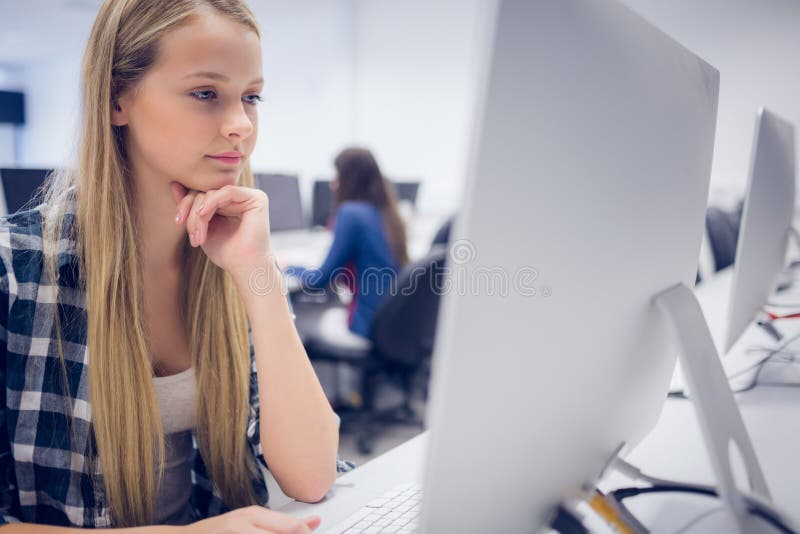 Serious Student Working with a Computer Stock Photo - Image of learning ...
