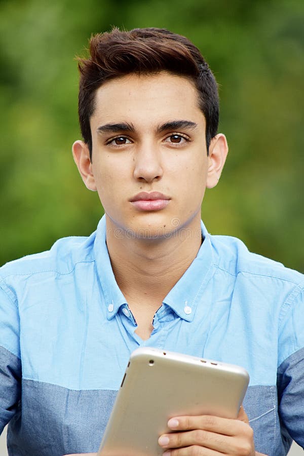 Serious Teen Boy Using Tablet Stock Image - Image of serious, male ...
