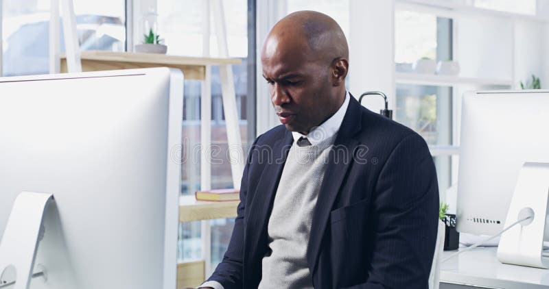 Serious, Thinking and Ambitious Manager Reading His Emails and Browsing ...