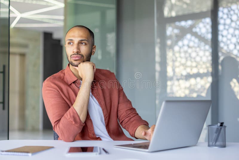 Serious Thinking Businessman at Workplace Inside Office Working with ...