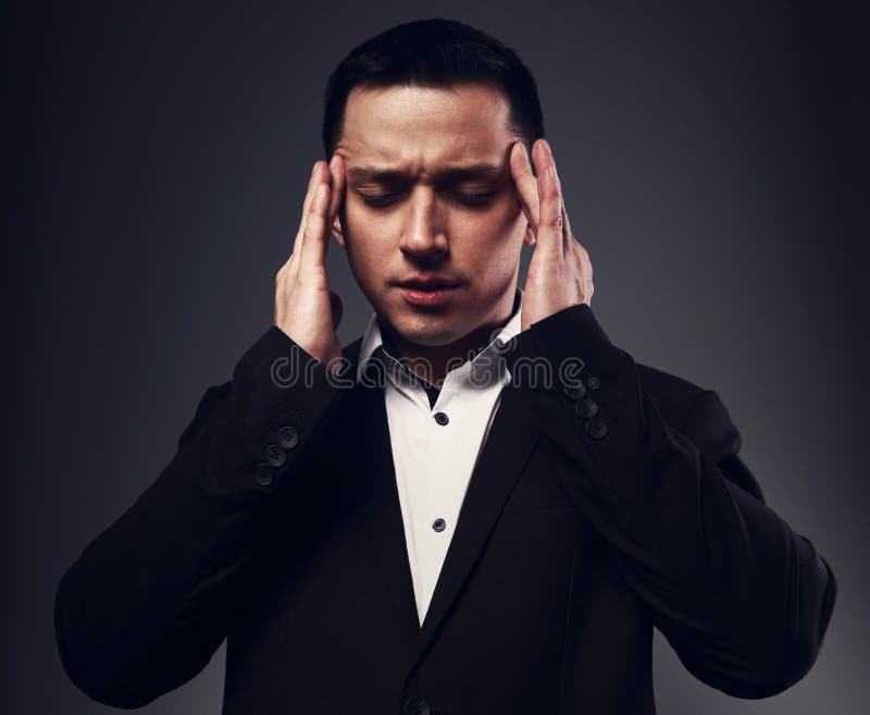 Serious Thinking Man with Thought-transference Abilities Holding the ...