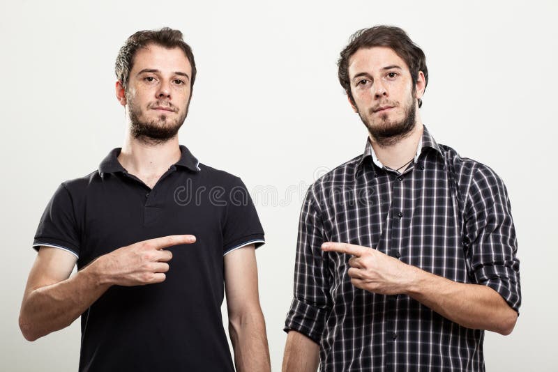 Serious Twins Pointing Each Other Stock Photo - Image of eyes, beard ...