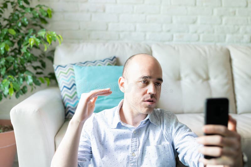 Serious Video Call from Home Stock Photo - Image of video, home: 180313954