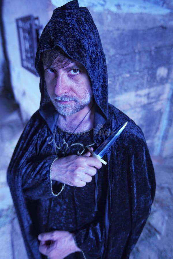 Serious Warlock with Dagger Stock Photo - Image of halloween, alone ...