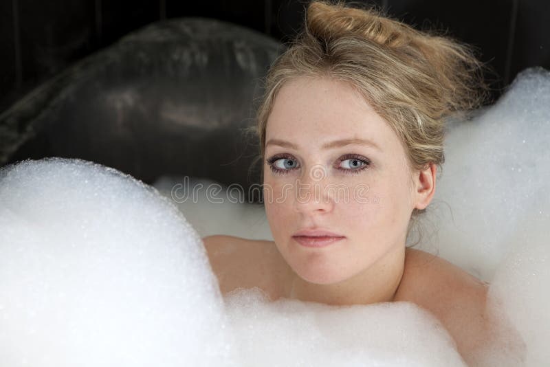 Serious Woman Enjoys the Bath-foam in the Bathtub. Stock Photo - Image ...