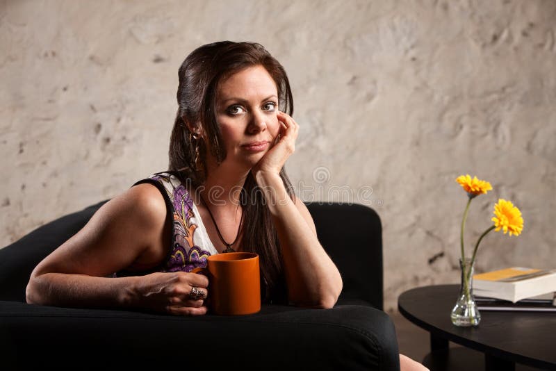 Serious Woman Sitting with Mug Stock Image - Image of serious, european ...