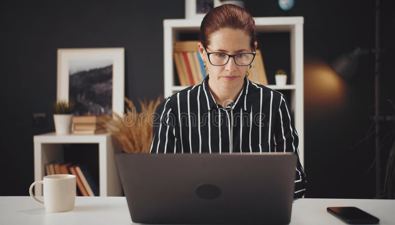 Serious Woman Working from Home Stock Image - Image of modern, internet ...