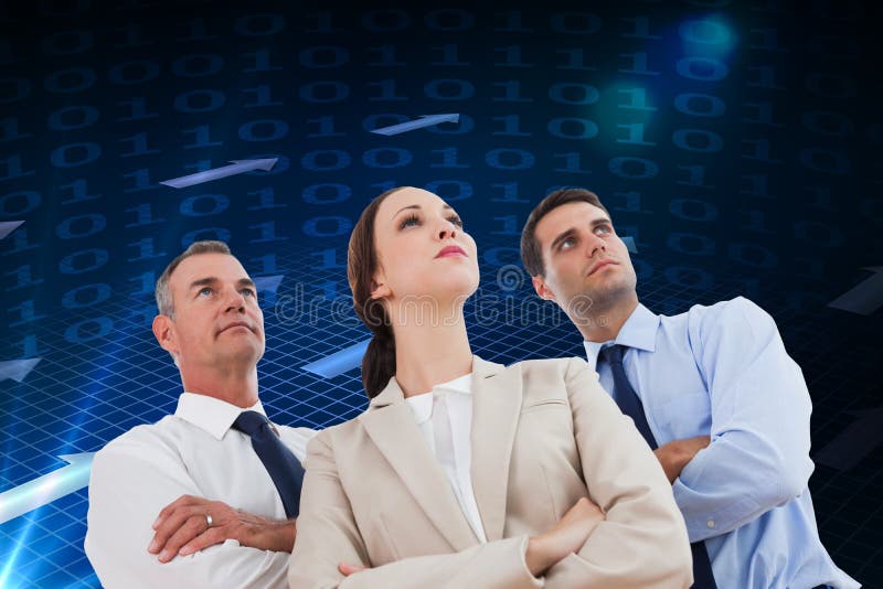 Serious Work Team Posing Together Looking Away Stock Photo - Image of ...