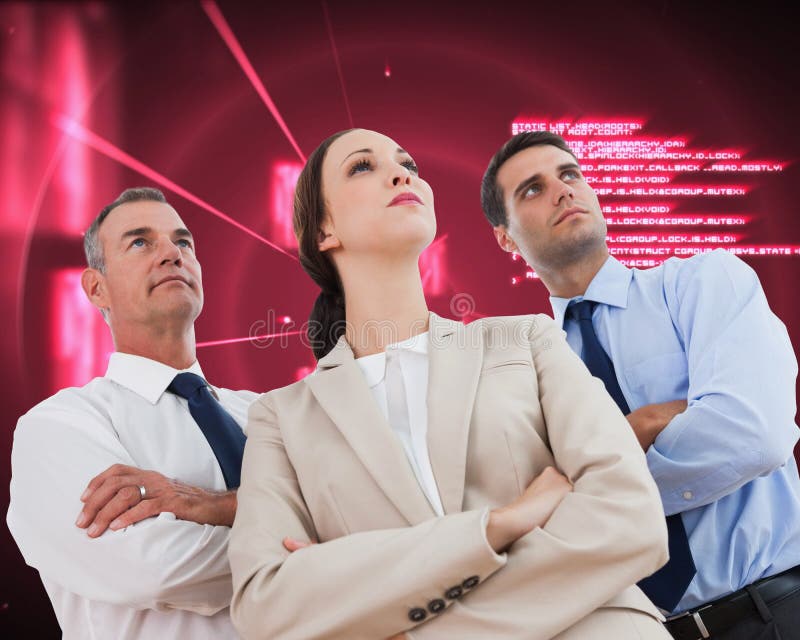 Serious Work Team Posing Together Looking Away Stock Photo - Image of ...