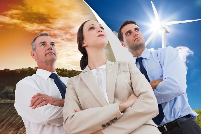 Serious Work Team Posing Together Looking Away Stock Photo - Image of ...