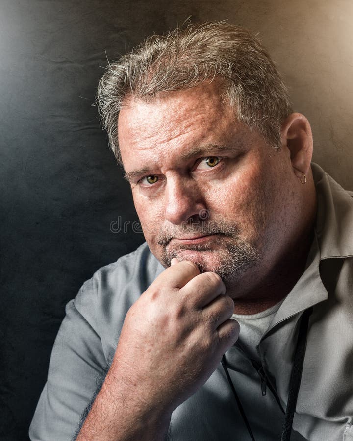 Serious working man stock image. Image of hand, macho - 42316169