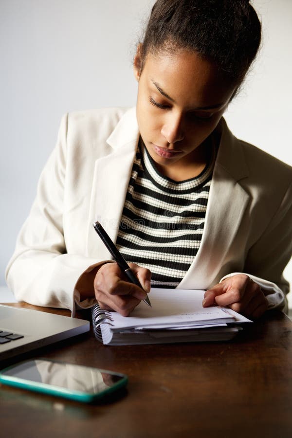 Serious Young Business Woman Taking Notes Stock Photo - Image of beauty ...