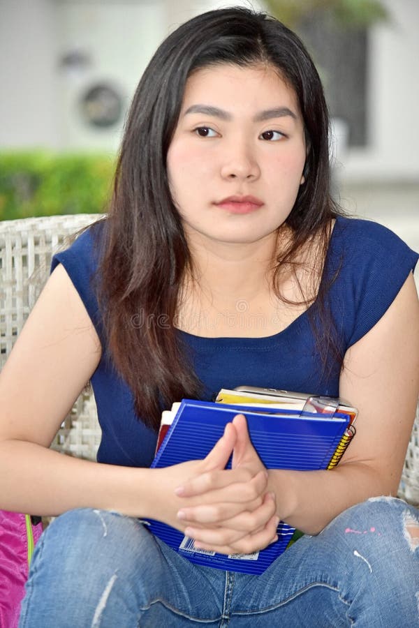Serious Young Chinese Girl Student with Notebooks Stock Photo - Image ...